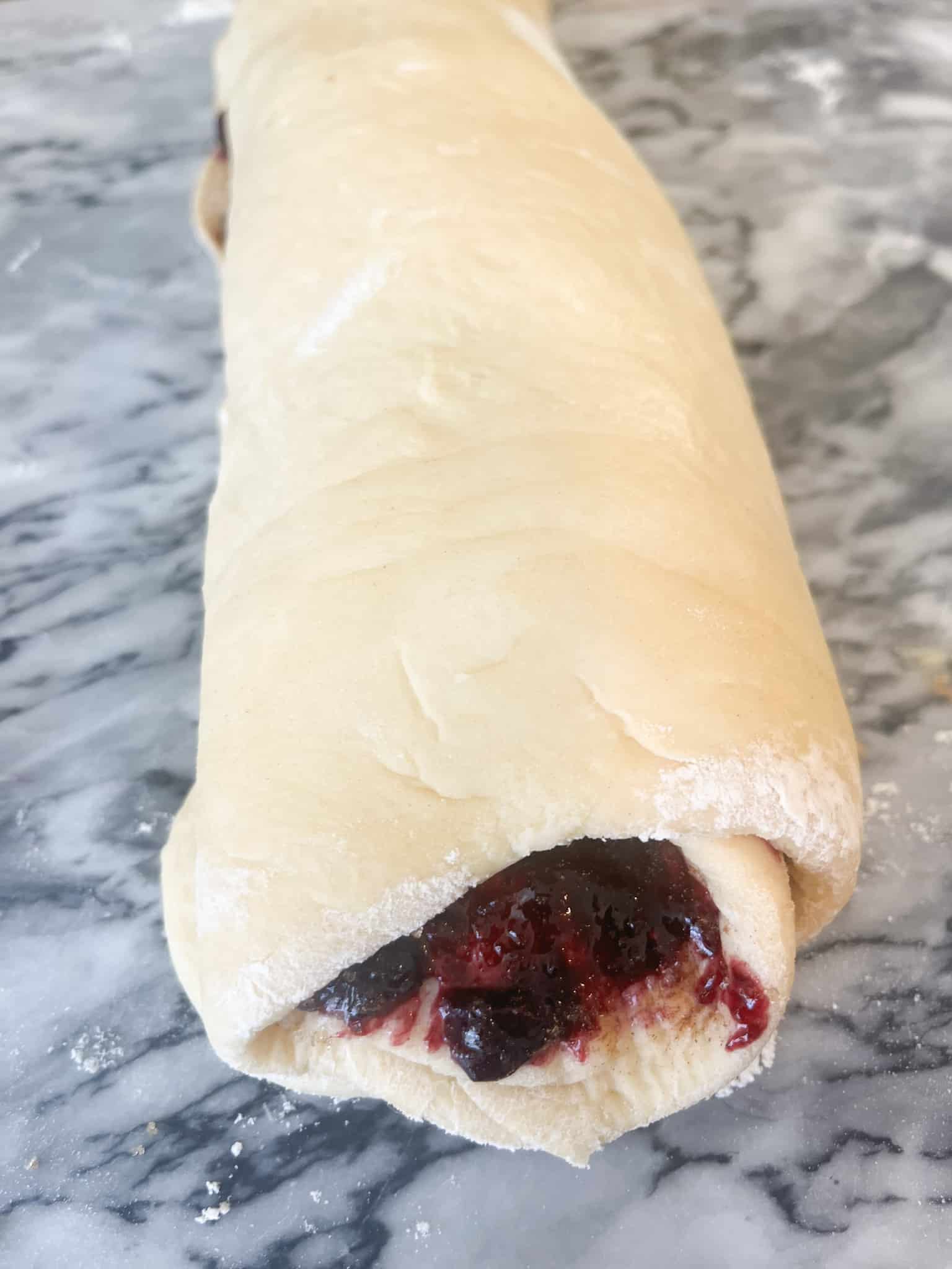 Blueberry Sourdough Cinnamon Rolls with Lemon Glaze Icing
